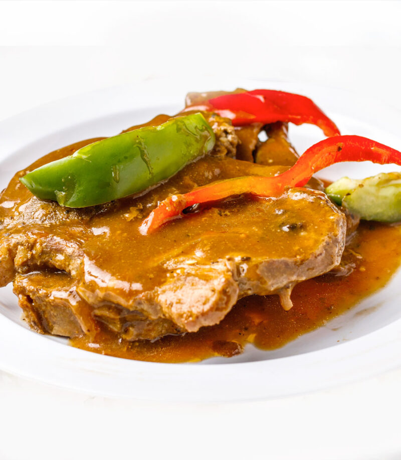 Smothered Pork Chops - Mikki's Soul Food Cafe